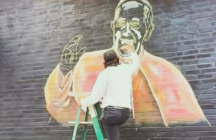 People Left Roses Under the Painting of Pope Outside of Little Cupcake ...